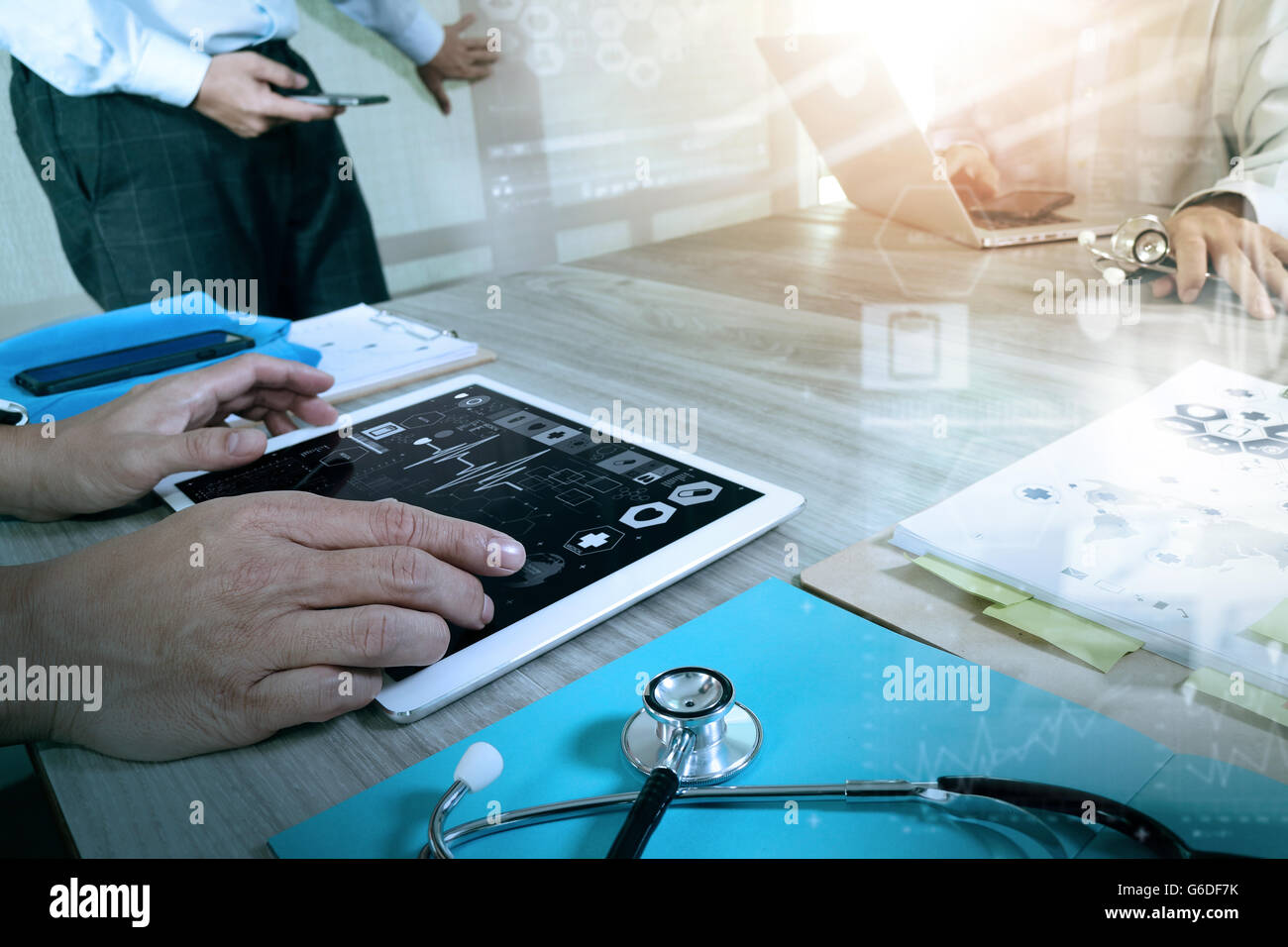 Medicine doctor hand working with modern computer and digital pro ...