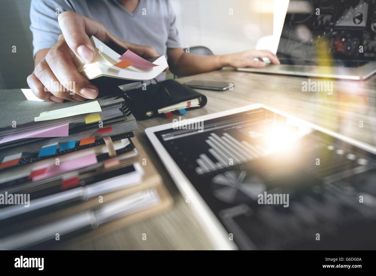 Website designer working digital tablet and computer laptop with smart phone and digital design ...