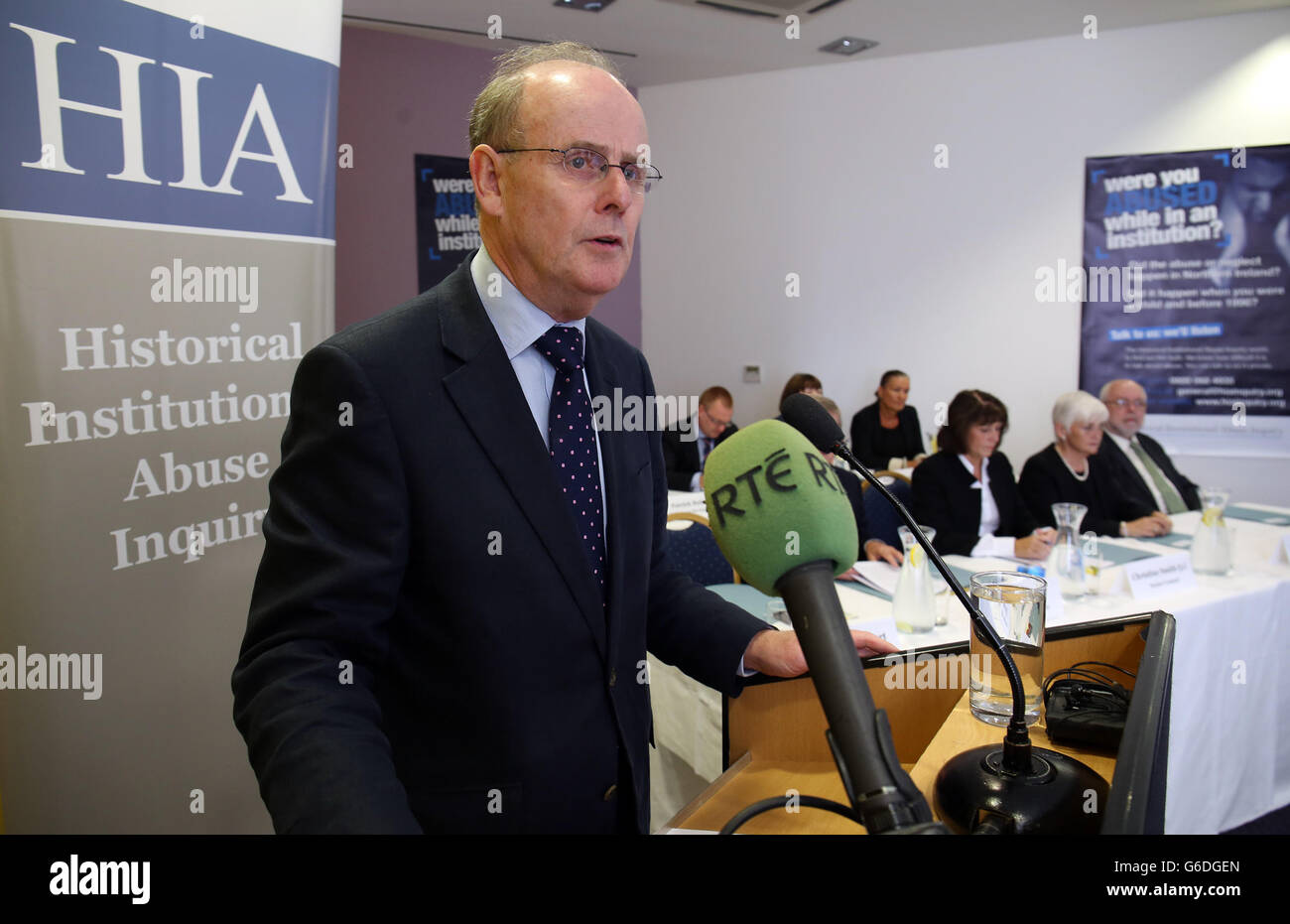 Retired judge Sir Anthony Hart speaking at a public meeting of the ...