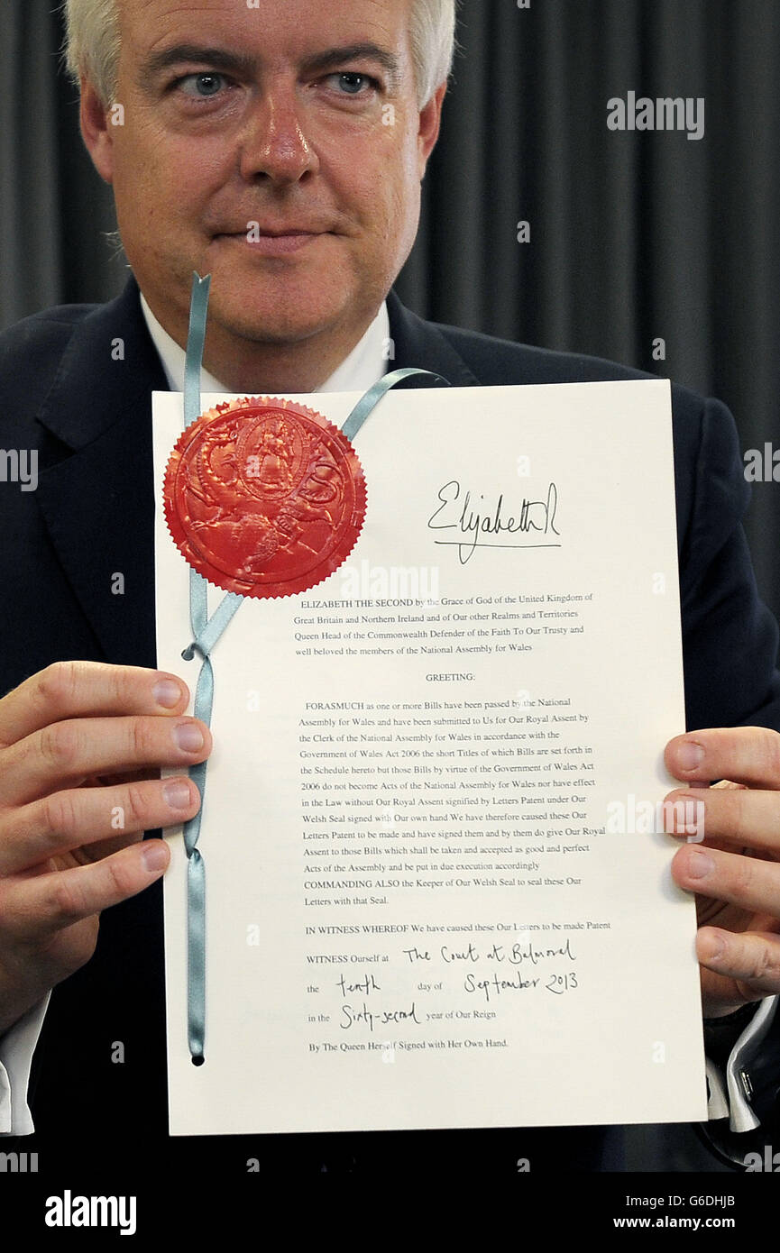 Carwyn Jones, Wales First Minister displays the letters patent after ...