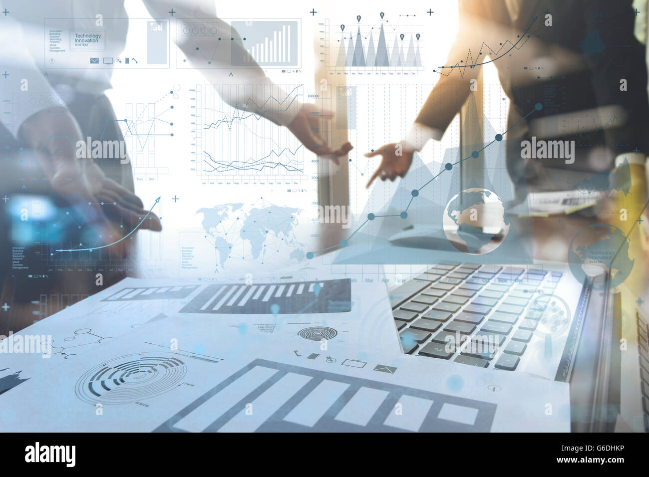 business documents on office table with smart phone and laptop computer ...