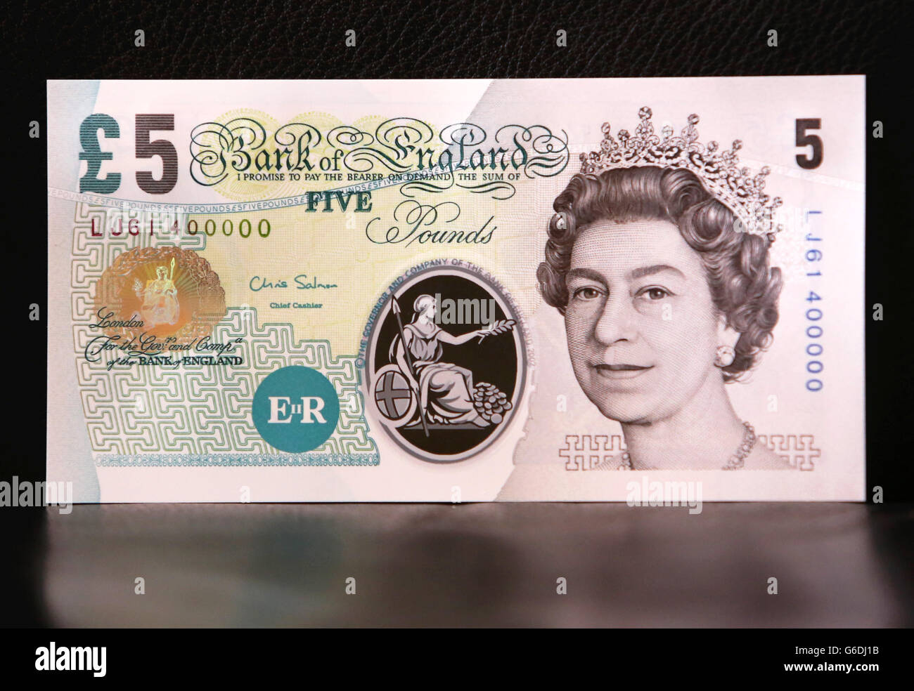 A sample of Polymer five pound banknote shown during the news ...