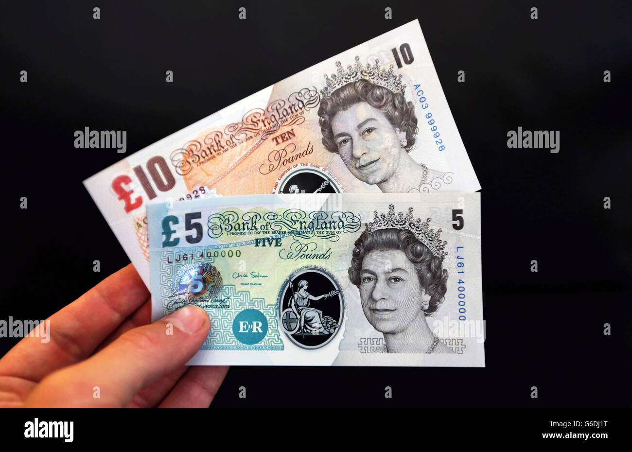 A sample Polymer five and ten pound banknote are shown during the news ...