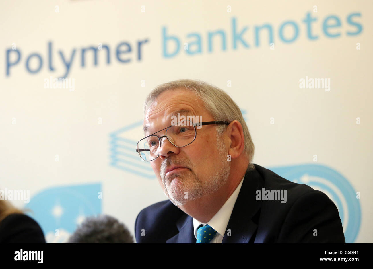 Plastic bank notes consultation Stock Photo - Alamy