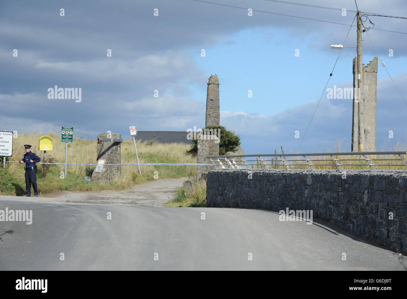 A Garda at the scene at Mornington Beach, near Drogheda, County Meath ...