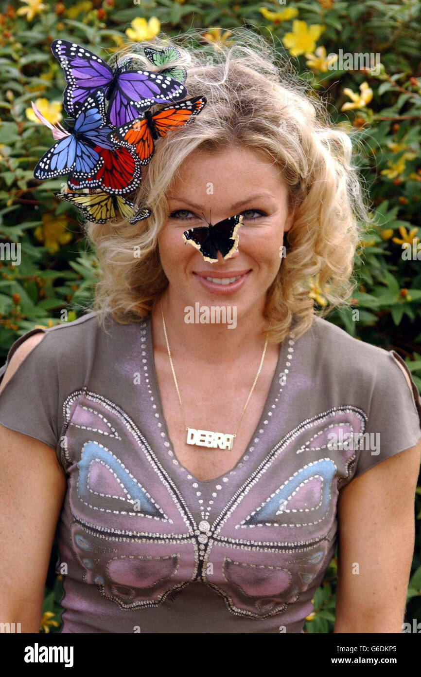 Nell McAndrew in London's Hyde Park with a butterfly on her nose to ...