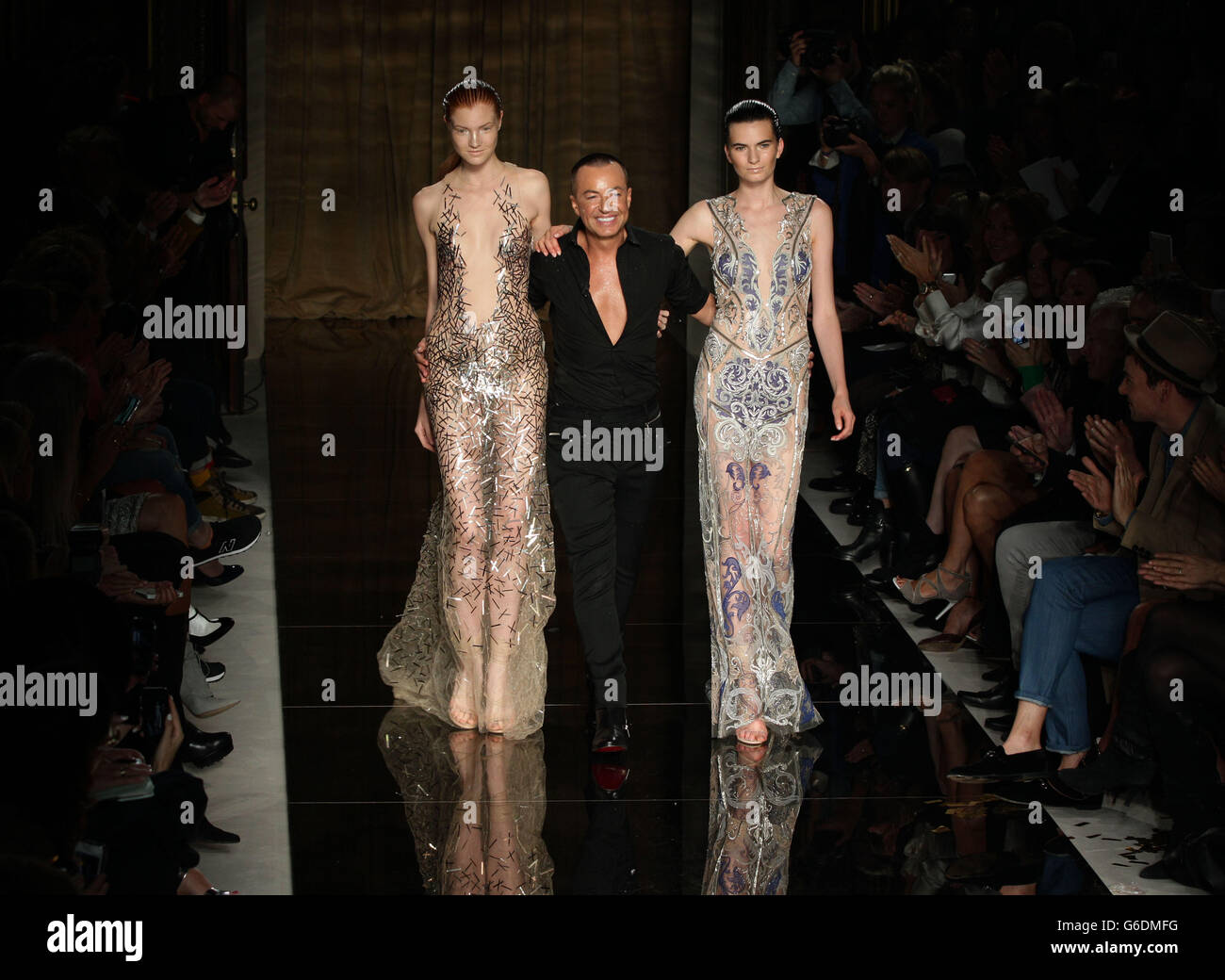 Julien Macdonald with models on the catwalk during his spring/summer ...