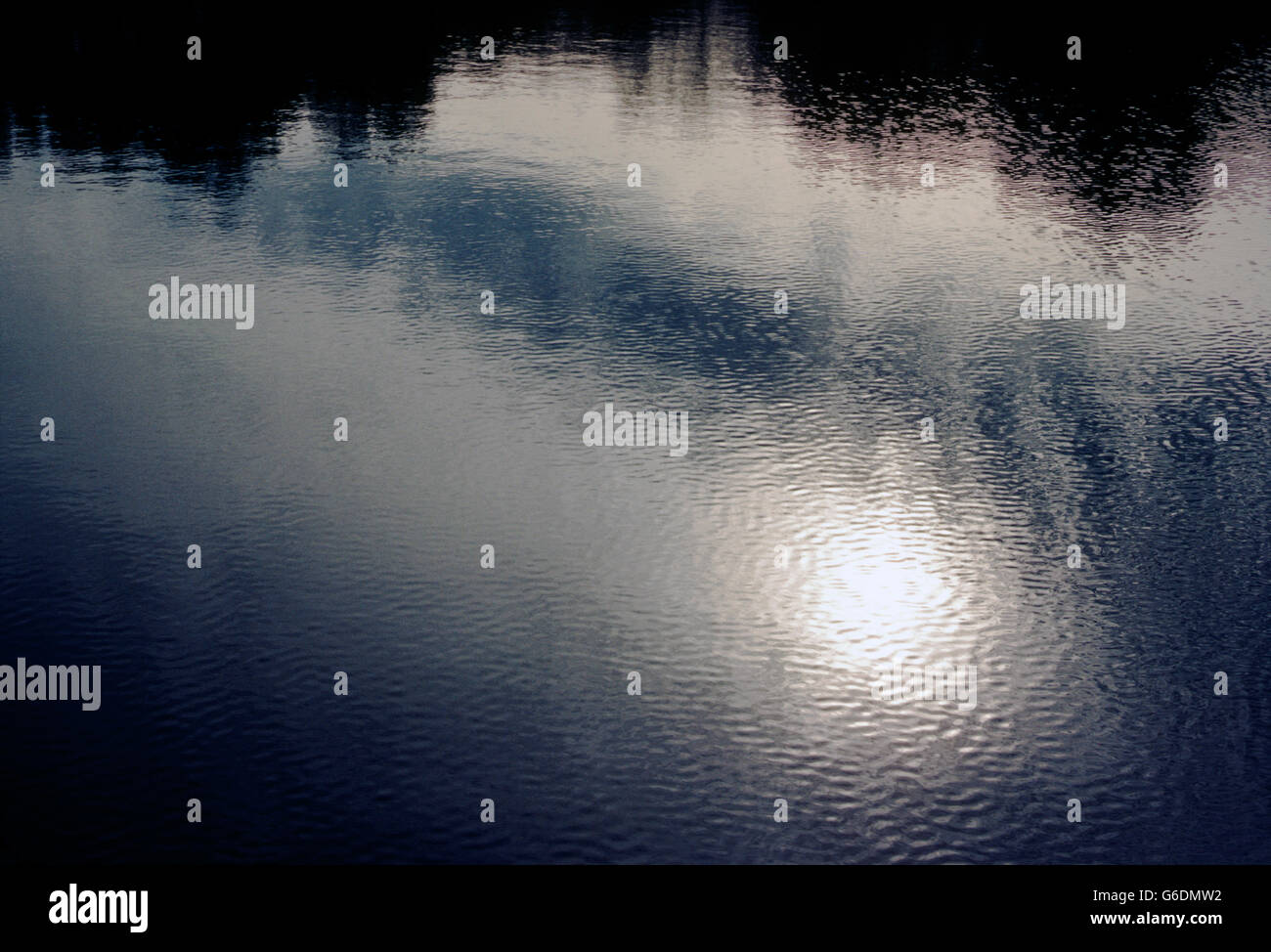 Aerial view of sun reflecting off ripples of water in a lake Stock ...