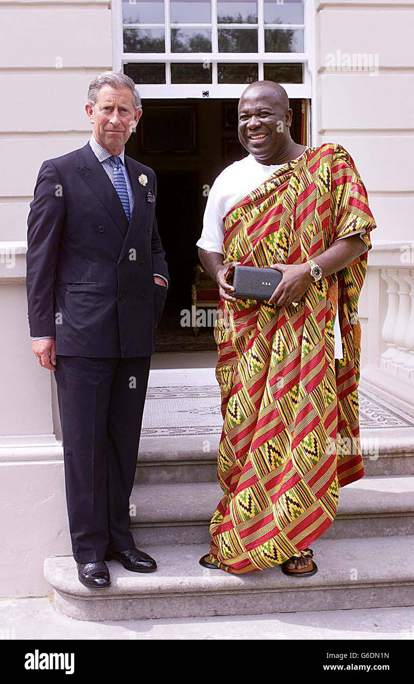 Prince of Wales presents a honorary KBE to Samuel Jonah from Ghana for ...