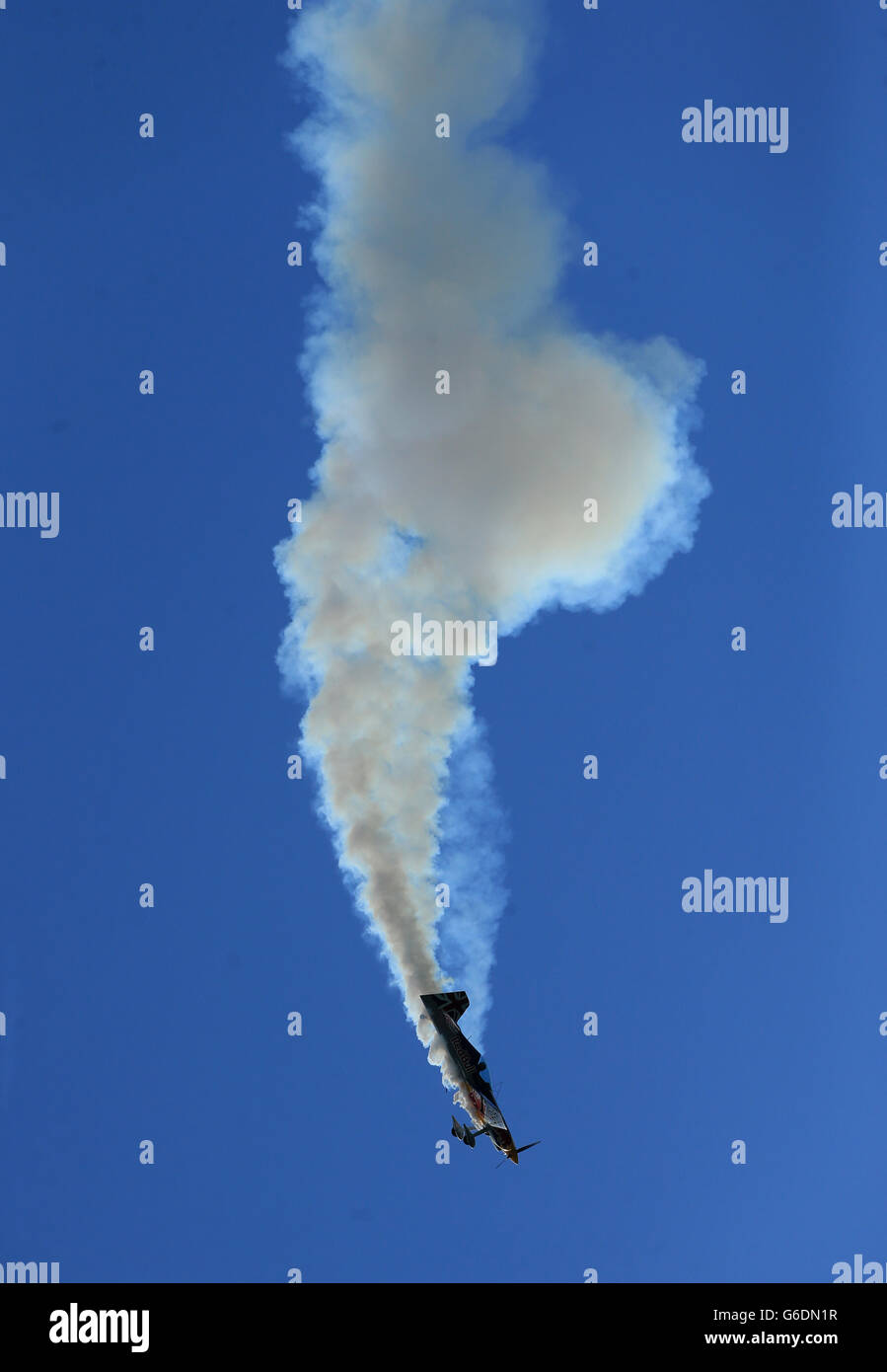 A Red Bull acrobatic plane performs stunts during day two of the Red ...