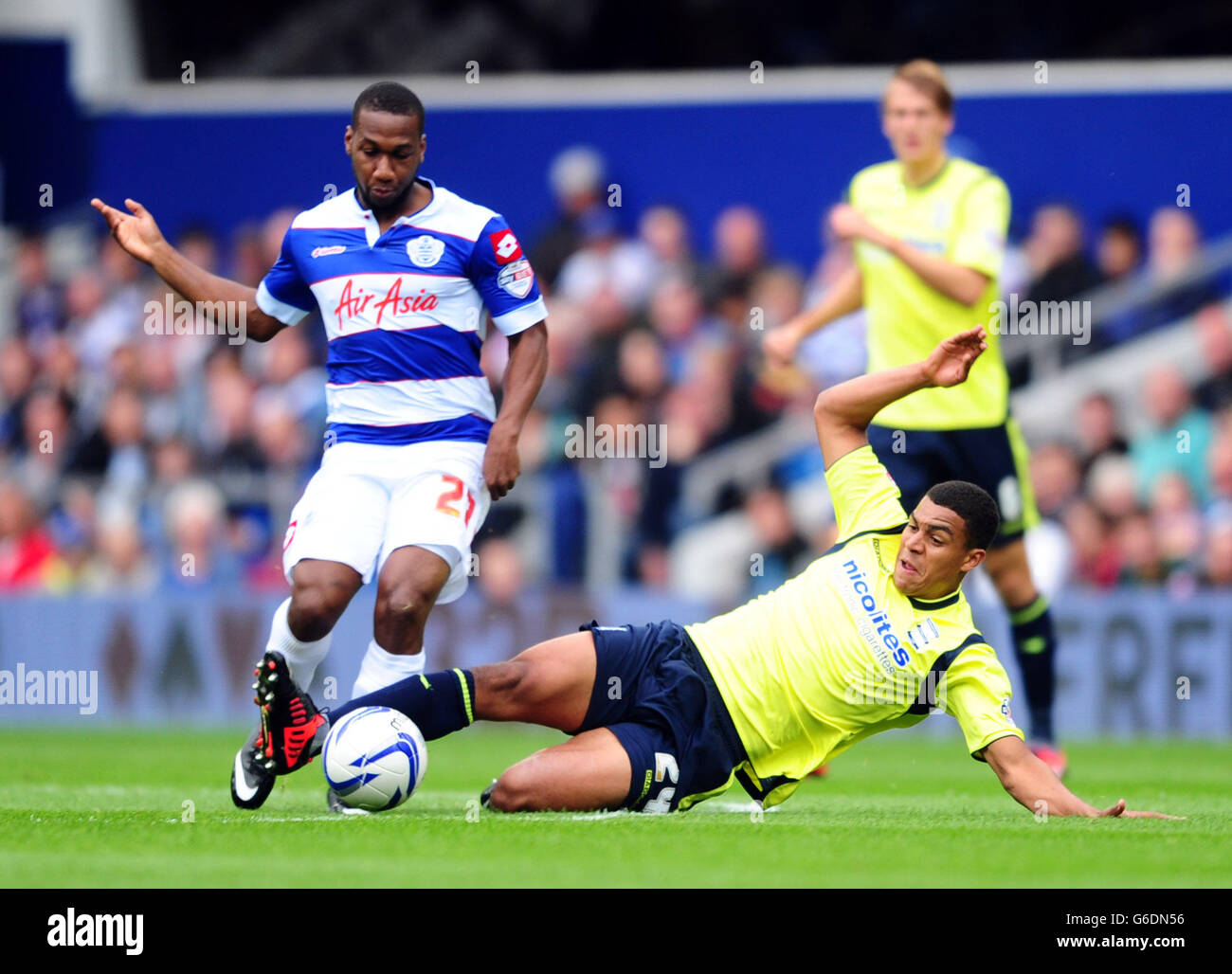 Queens Park Rangers' Junior Hoilett and Birmingham City's Tom Adeyemi ...