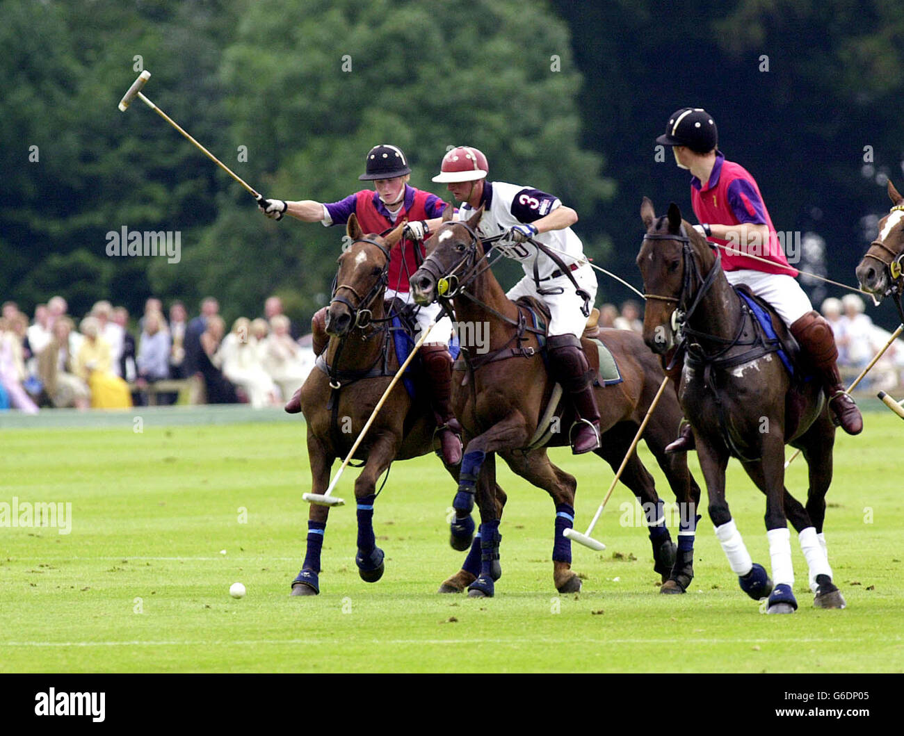 Prince Harry (left) in action playing for Highgrove during their ...