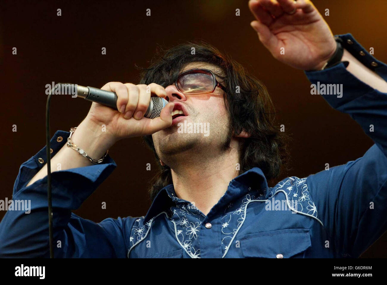 The Charlatans lead singer Tim Burgess performing on stage at T in the ...
