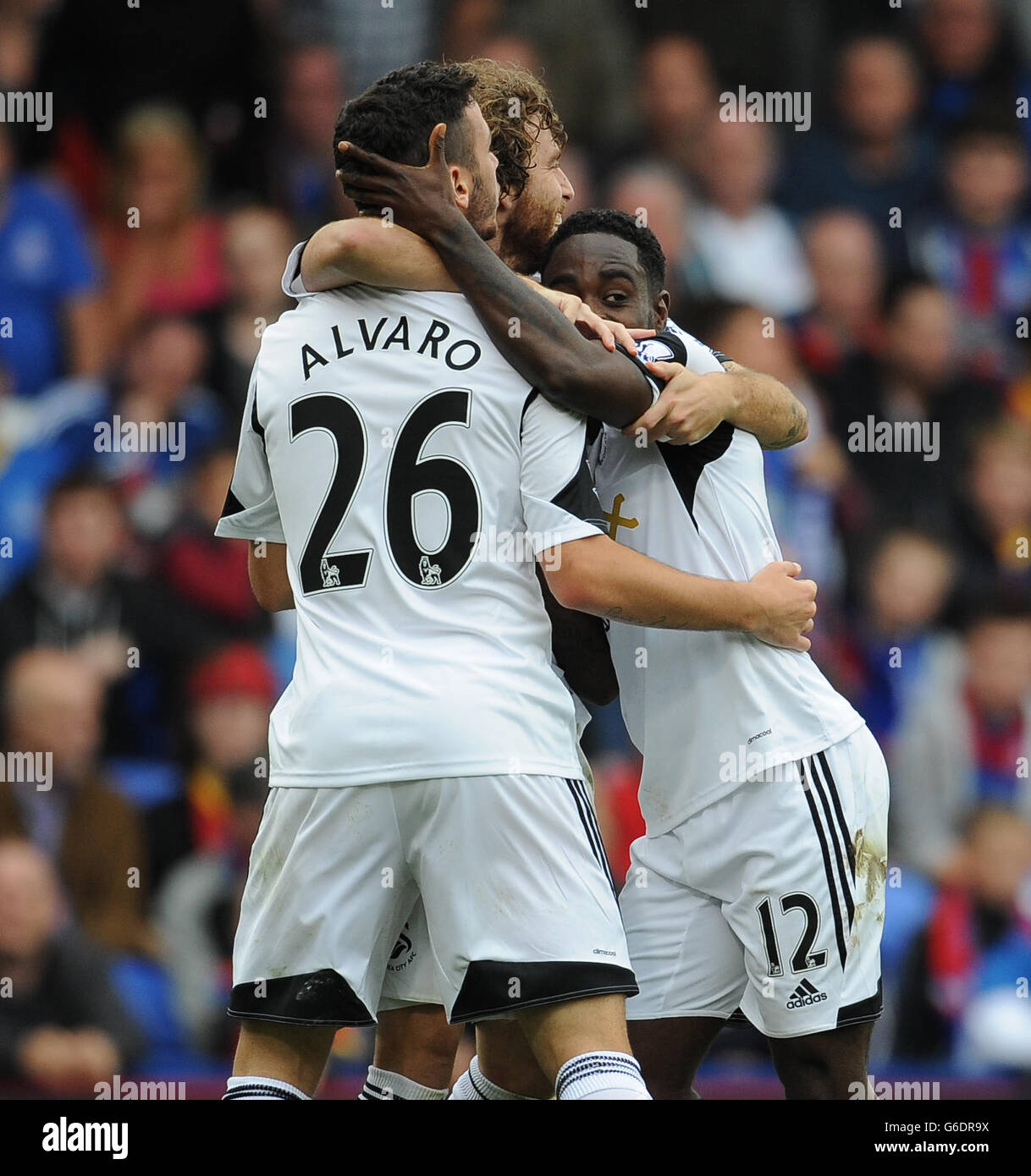Swansea City's Nathan Dyer (right) celebrates with Alvaro Vazquez (26 ...