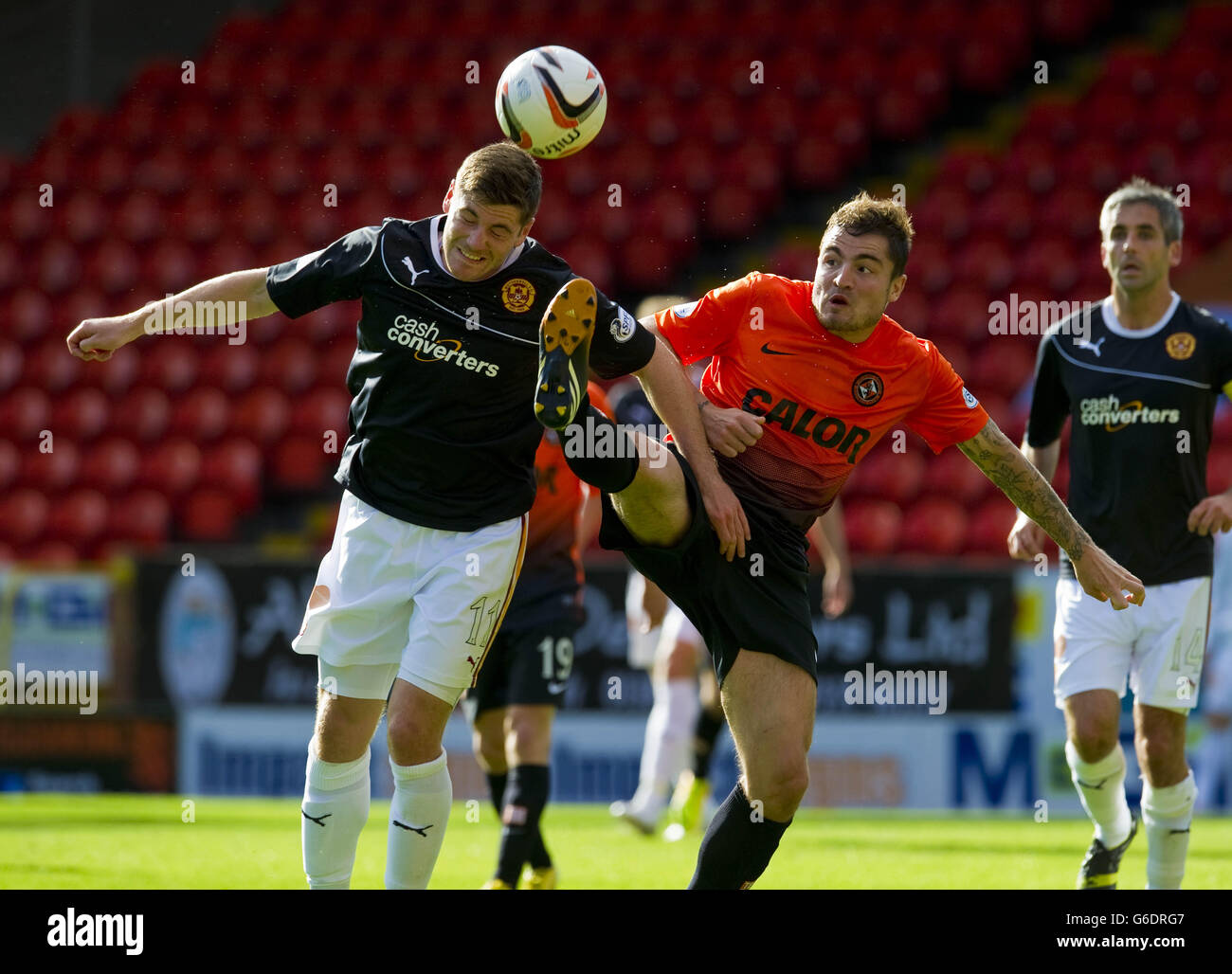 Motherwell's Iain Vigurs (left) and Dundee United's Paul Paton in ...