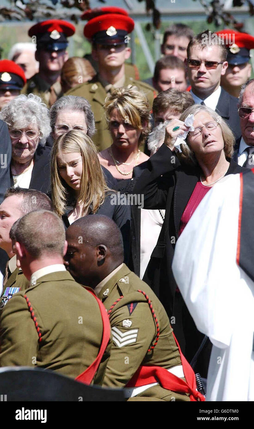 Sarah Tash (C) the girlfriend of Lance Corporal Ben Hyde and his mother Sandra (R) at his ...