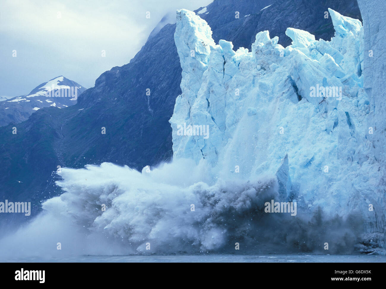 USA, Alaska, Glacier Bay National Park, Massive icebergs calve from ...