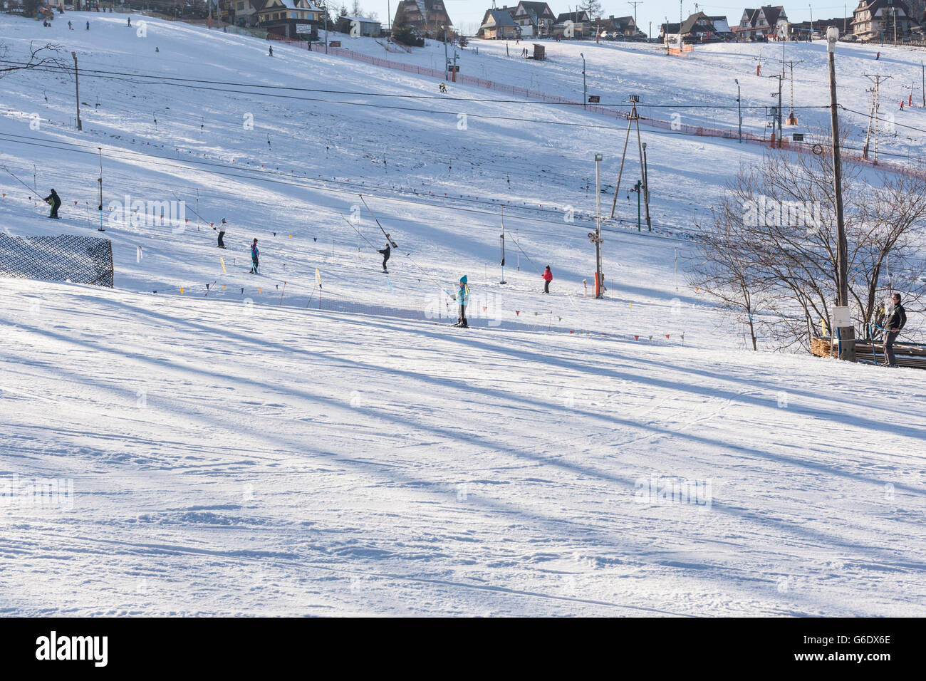 Skiing and sliding, winter time in Tatra Mountains Stock Photo - Alamy
