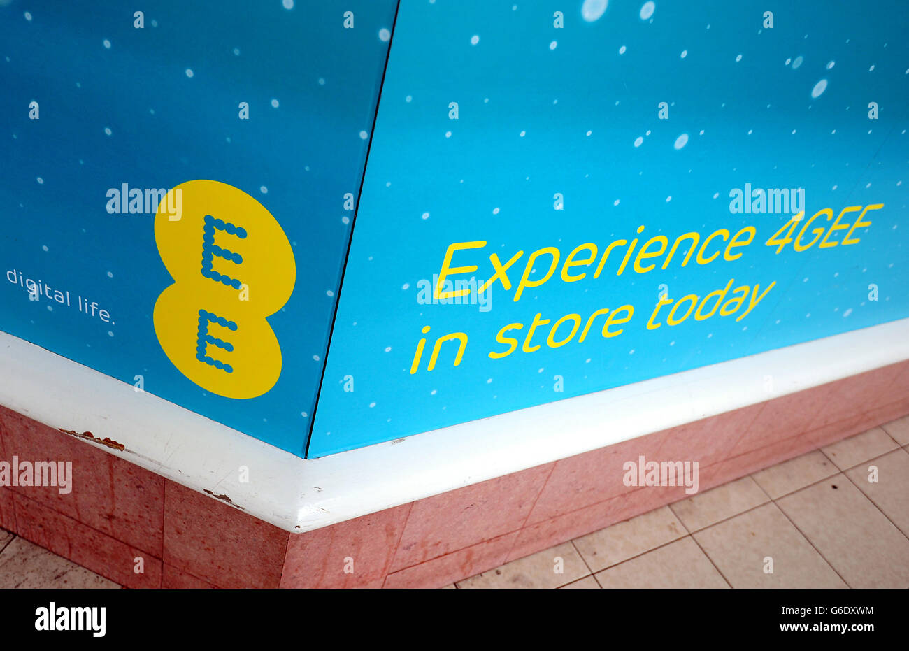 Mobile phone stock. General view of EE network sign outside a shop in ...