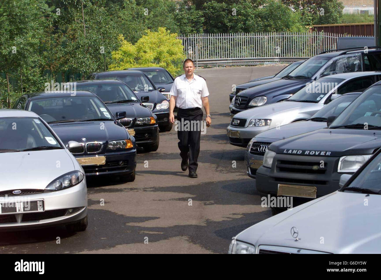 A collection of recovered luxury vehicles at the Metropolitan Police ...