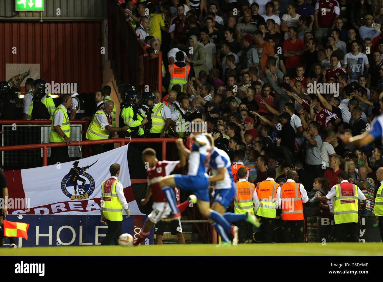 Bristol City's fans on the right are kept away from Bristol Rovers fans ...