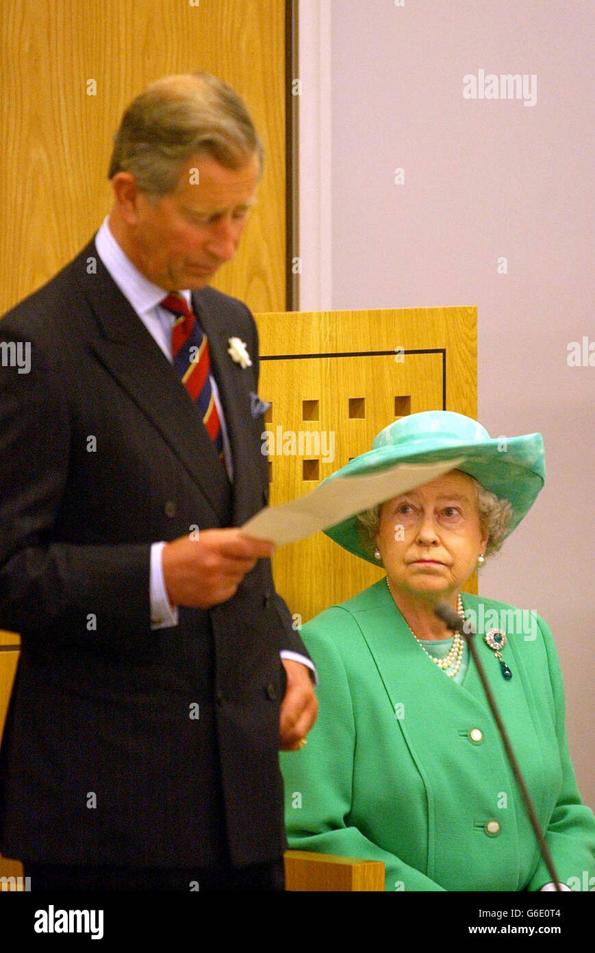 The Queen listens as Prince Charles delivers a Welsh language address ...