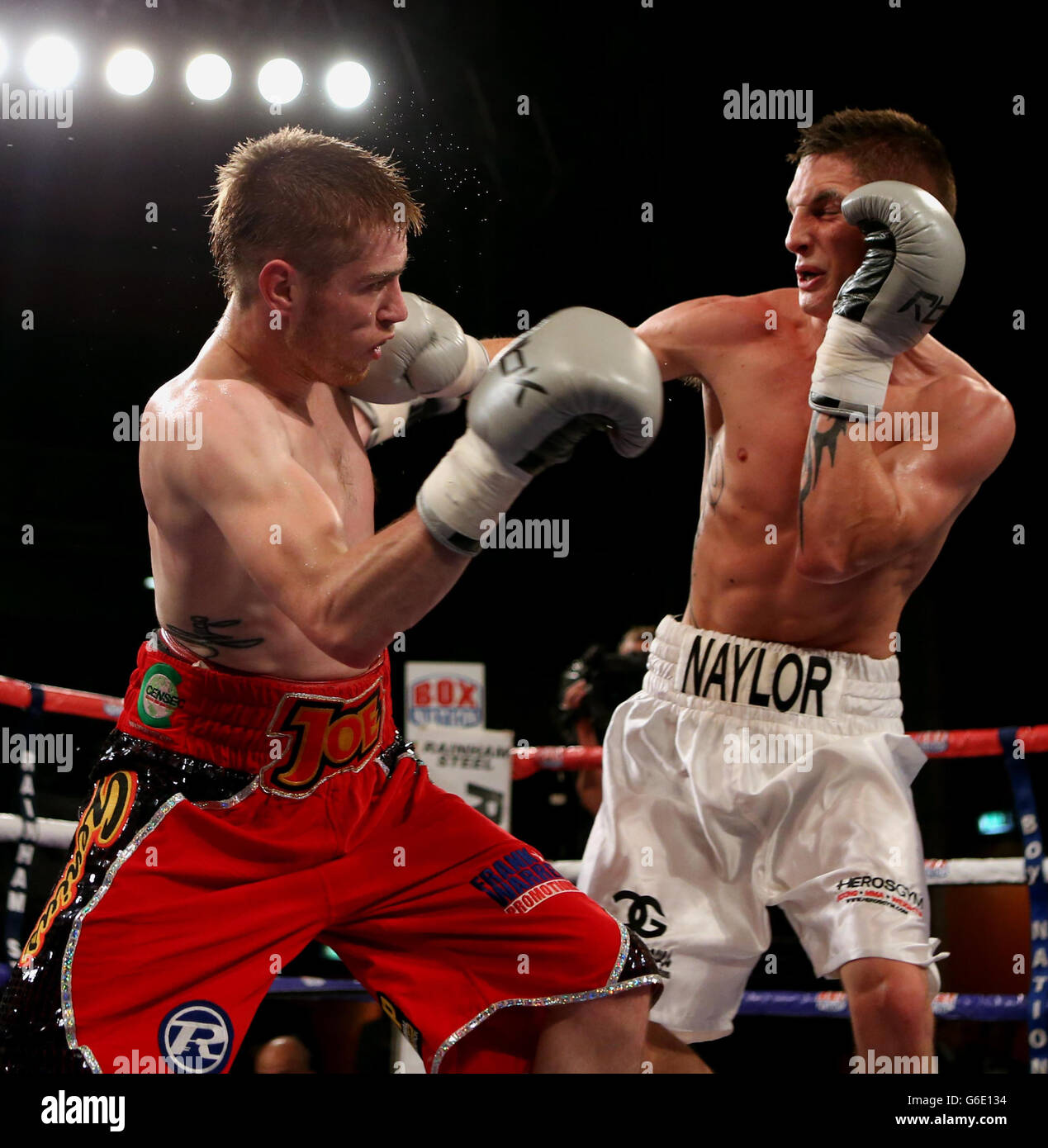 Boxing - Liverpool Olympia. Joe Murray (left) in action against Dan ...