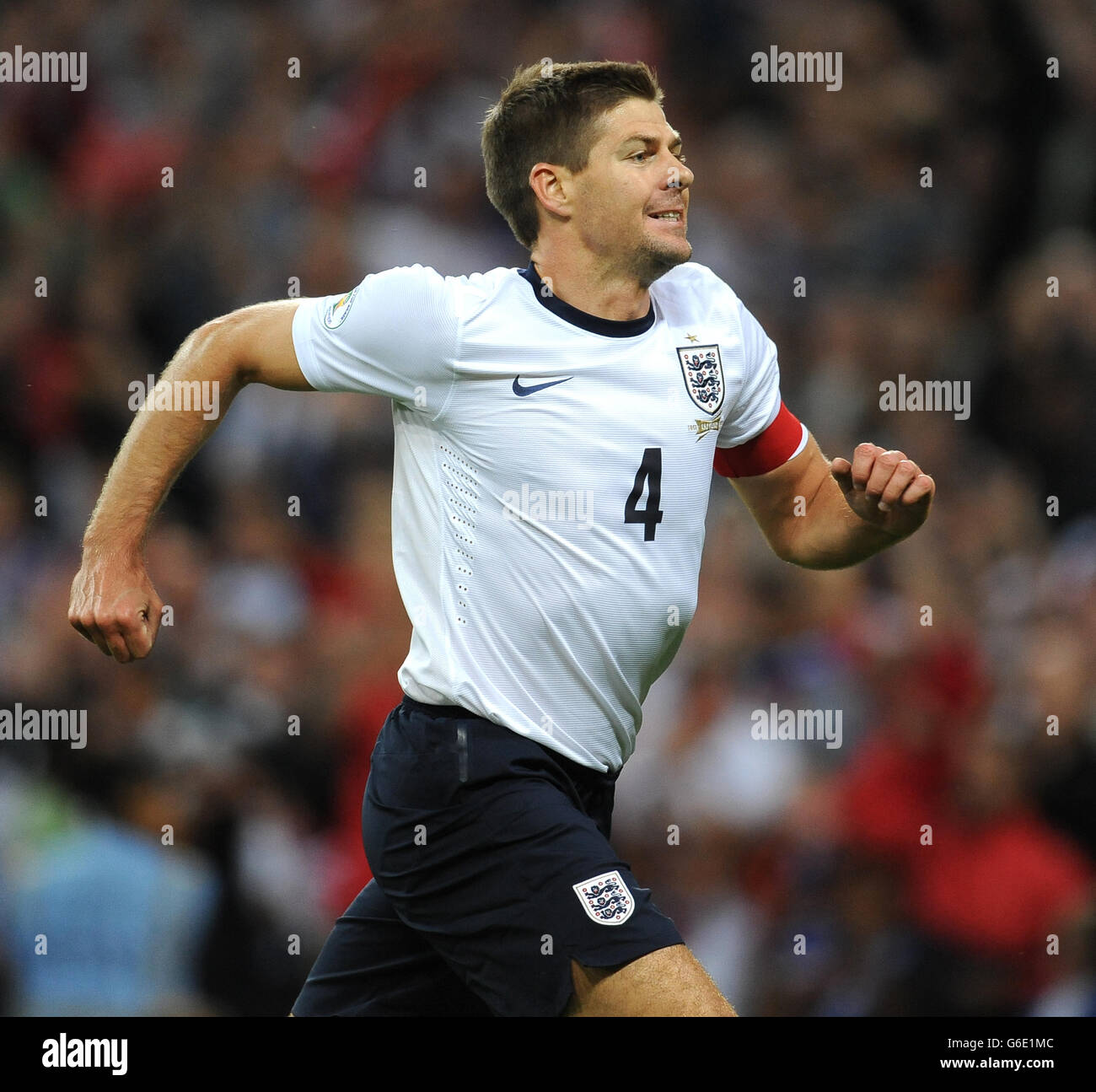 England's Steven Gerard celebrates after scoring the opening goal of ...