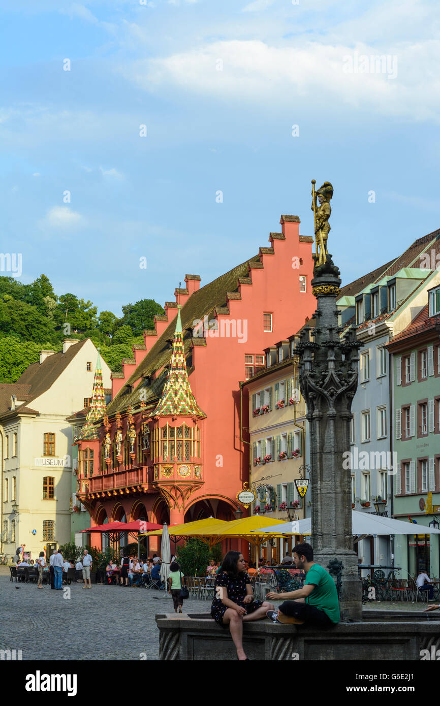 square Münsterplatz in Old Town, Historical Merchants Hall (red ...