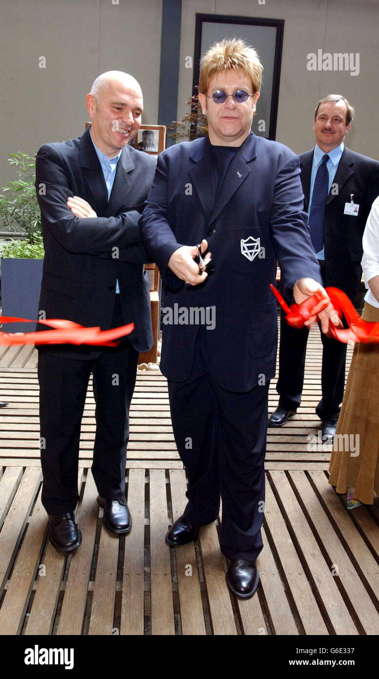 Sir Elton John and Anthony Minghella pose for the media during a ...