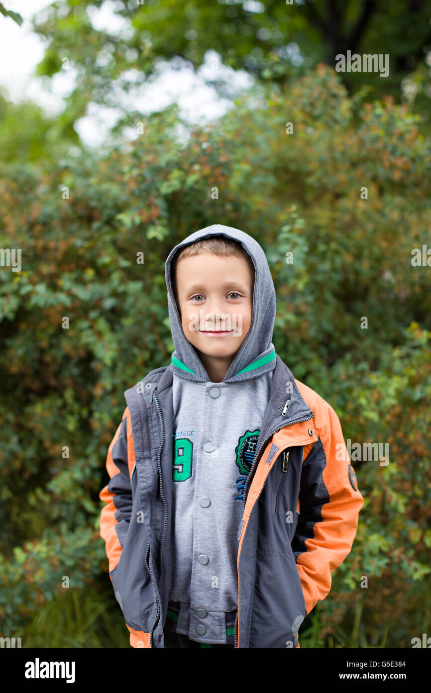 The boy looks at the camera Stock Photo - Alamy