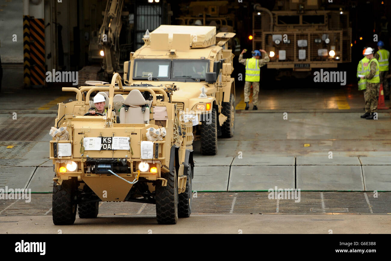 Military Vehicles are checked as they are off-loaded from the Anvil ...