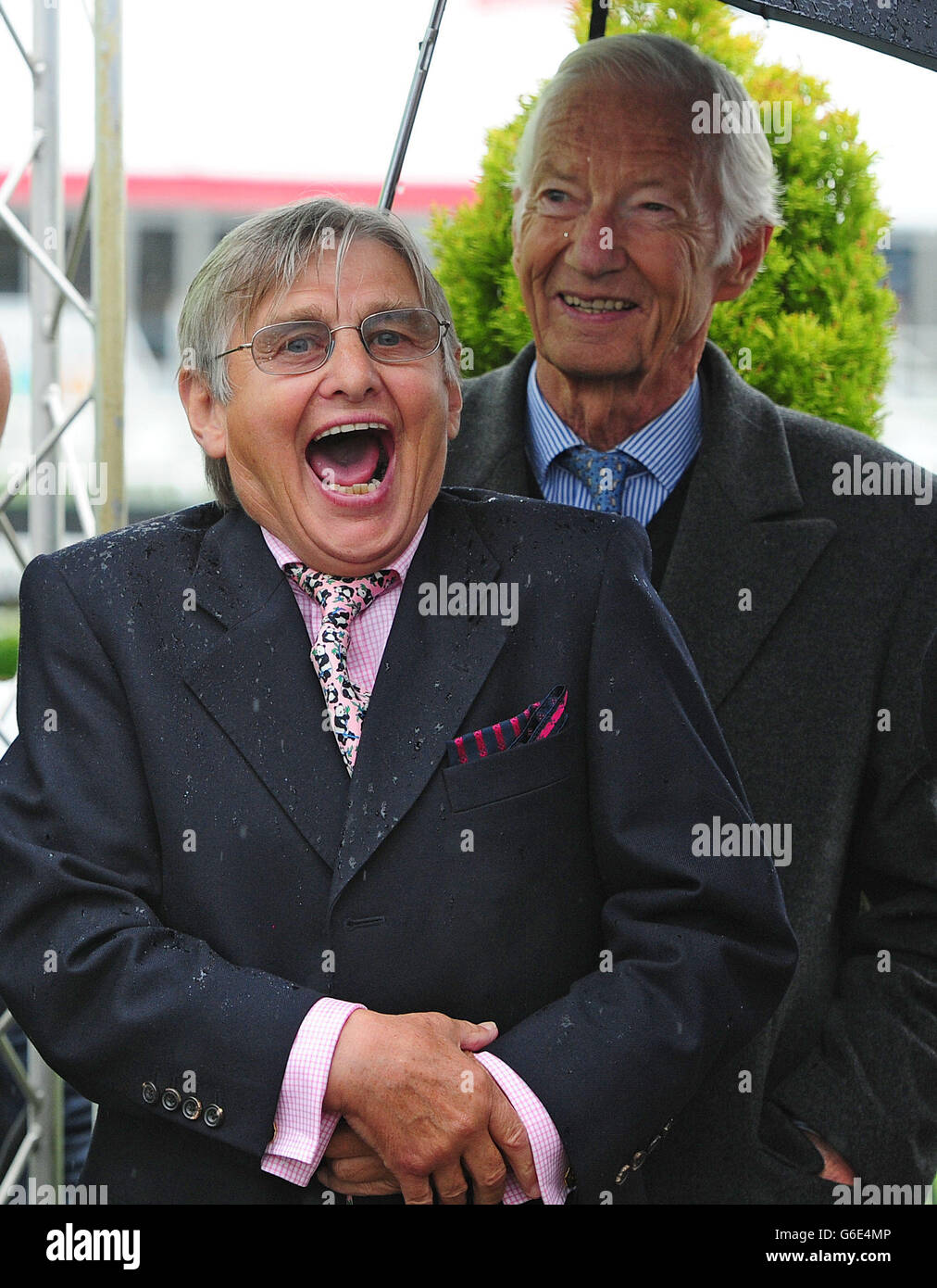 Former jockeys Willie Carson (left) and Lester Piggott share a joke in ...