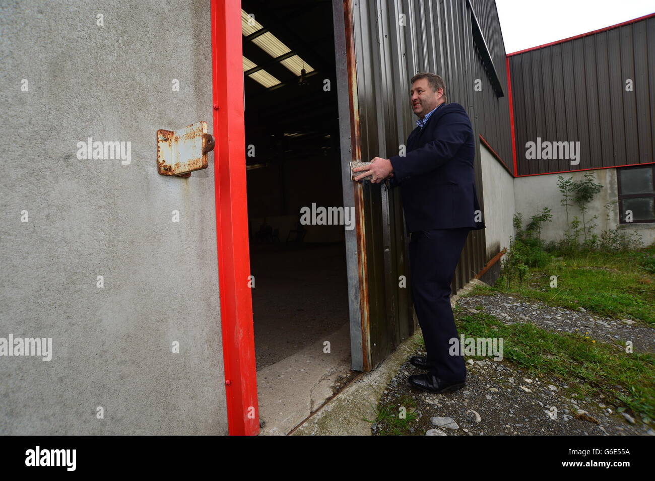 An Office of Public Works (OPW) representative unlocks the building ...