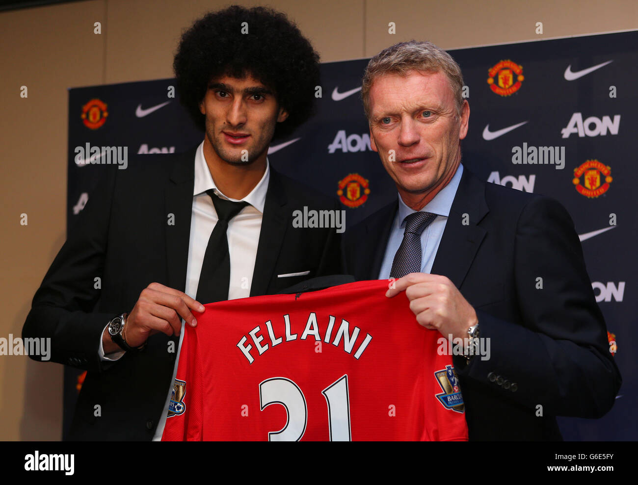 New Manchester United signing Marouane Fellaini and manager David Moyes ...
