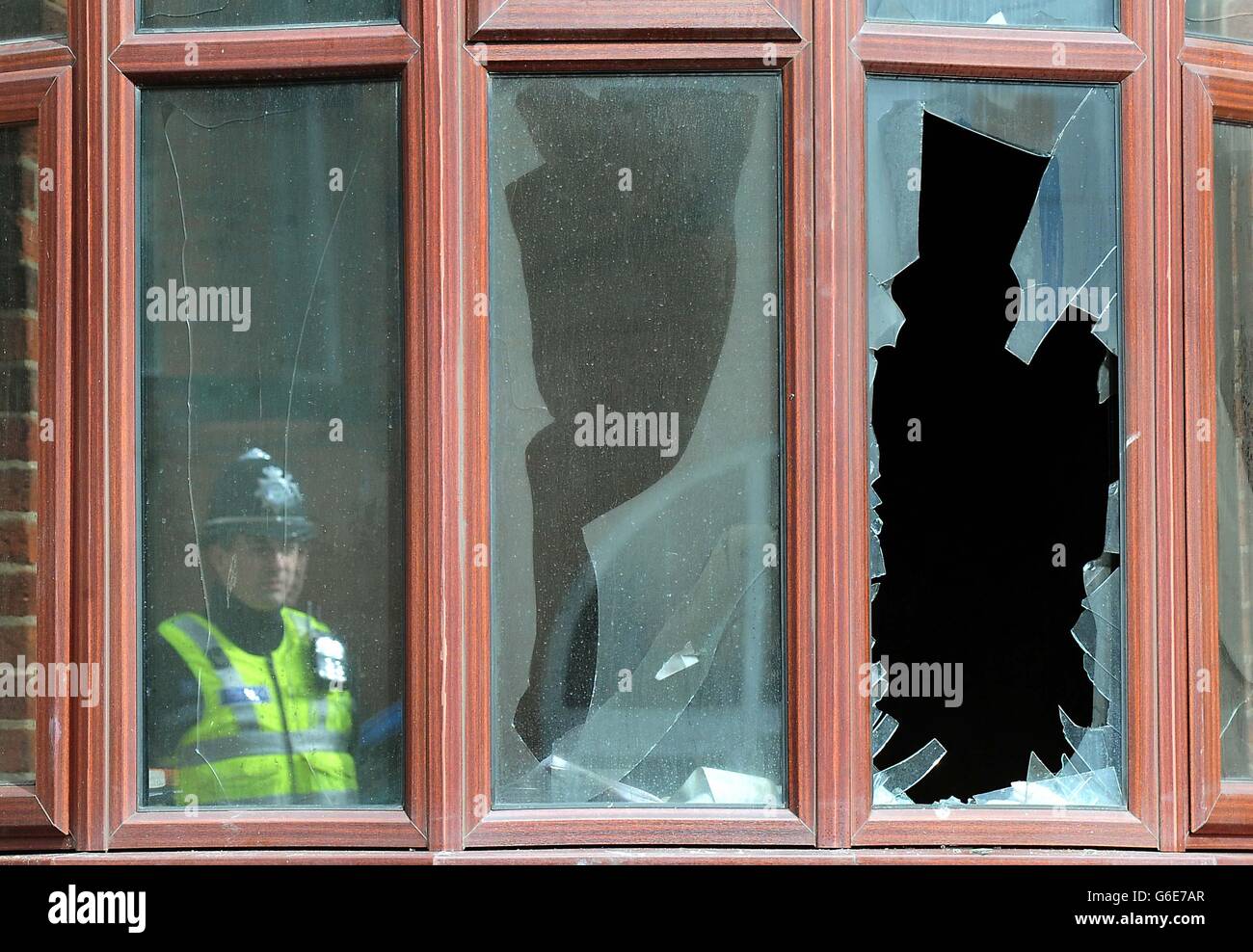 Broken windows at the scene of a fatal house fire in Wood Hill ...