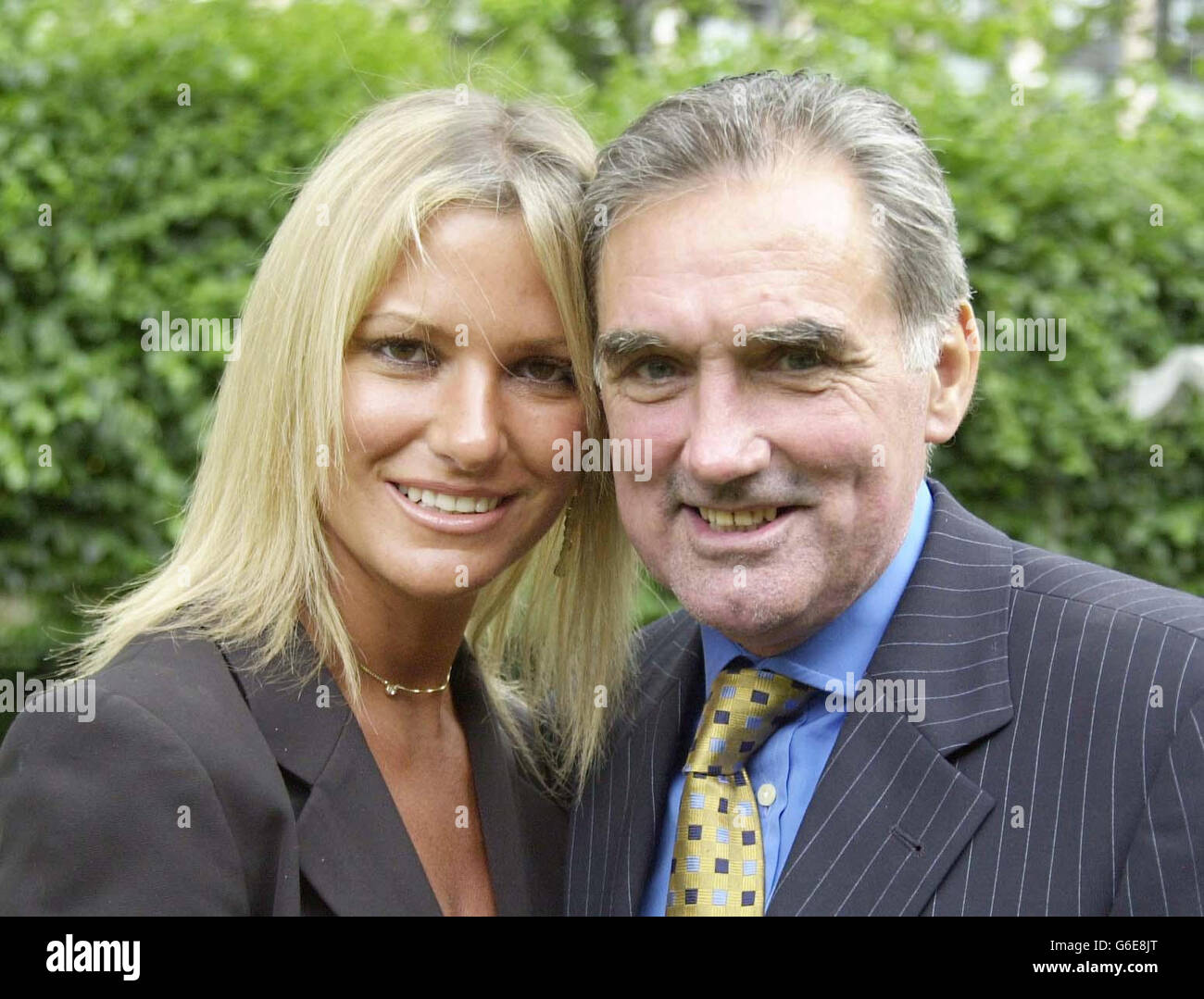 Football legend George Best with his wife, Alex, at the Houses of ...