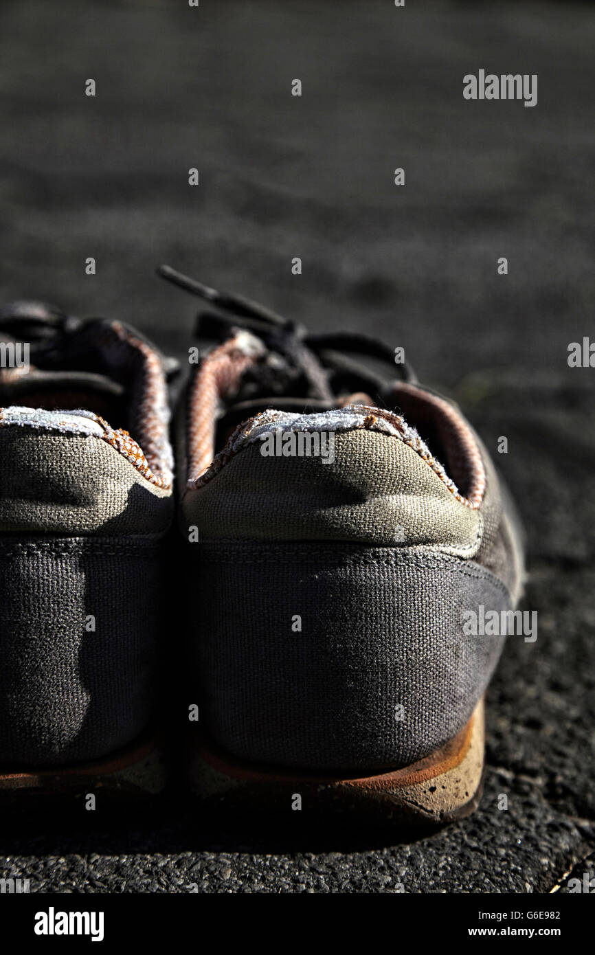 Worn out running shoes Stock Photo - Alamy