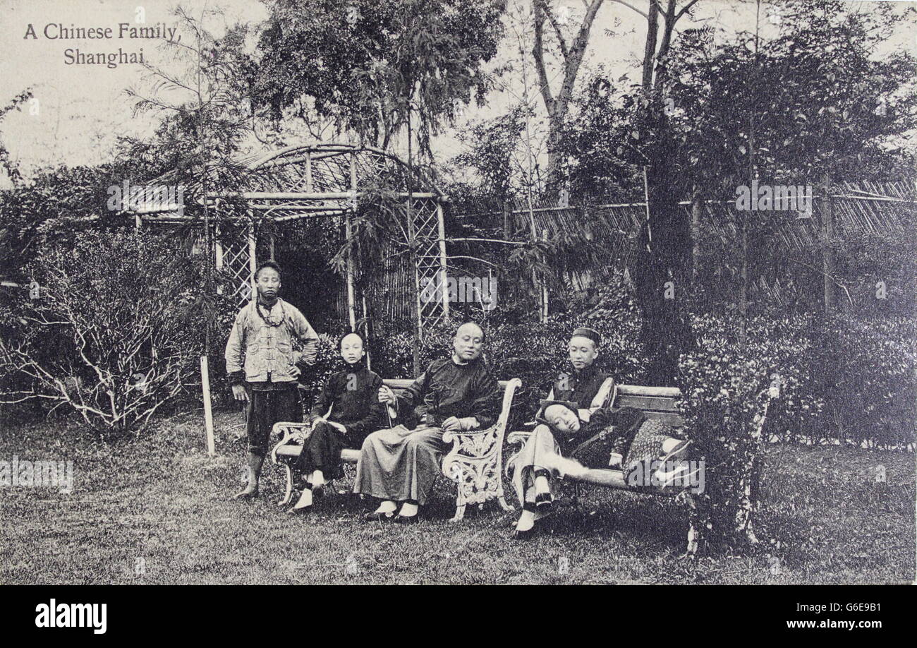 Vintage postcard of a Chinese family in Shanghai Stock Photo - Alamy