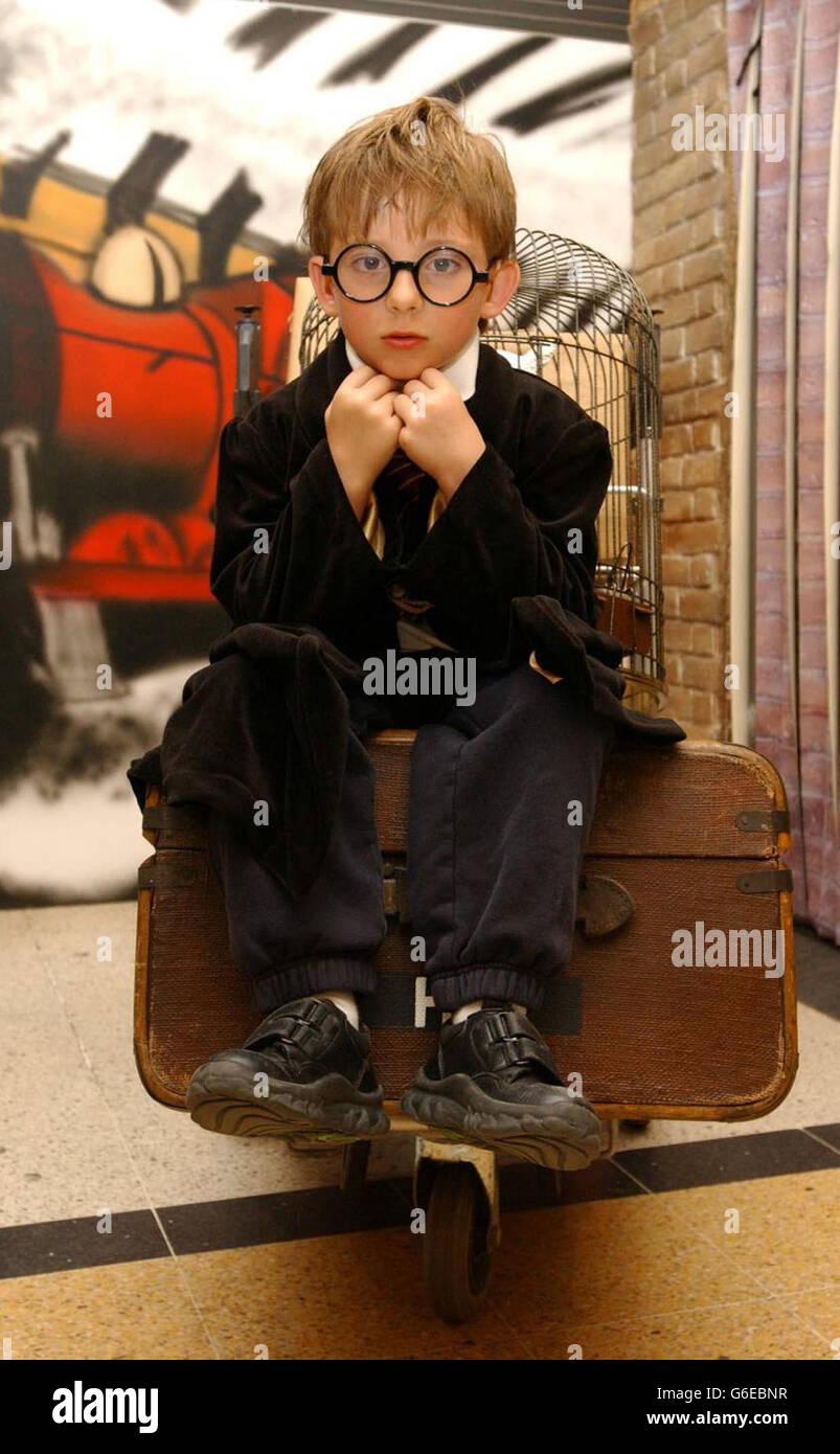 Guy Williams, 6, from Enfield dresses up as Harry Potter as he waits ...