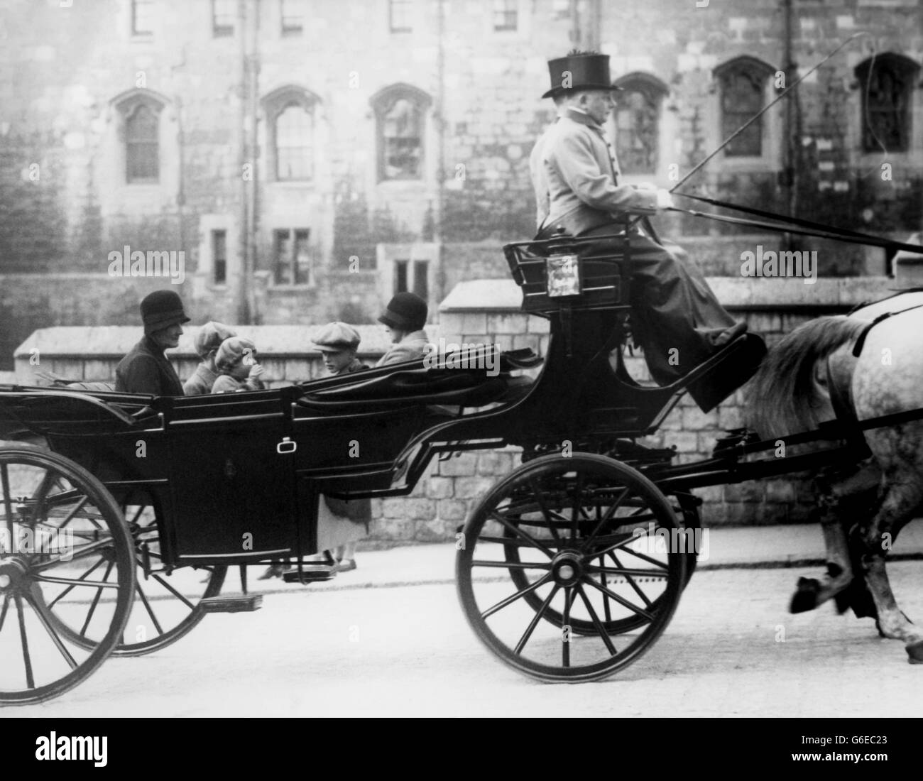 Princess Elizabeth waving her hand in acknowledgement of the crowd's ...