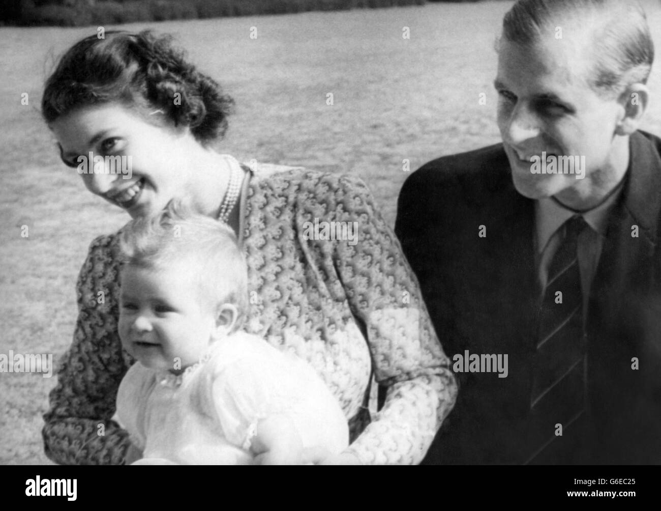 These pictures of eight year old Prince Charles and his Royal parents ...