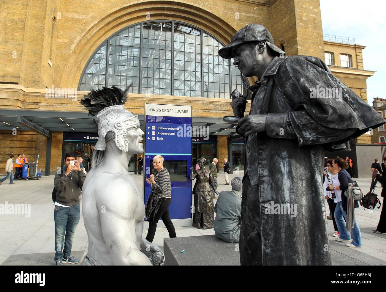 Street entertainers during the official opening of Kings Cross Square ...