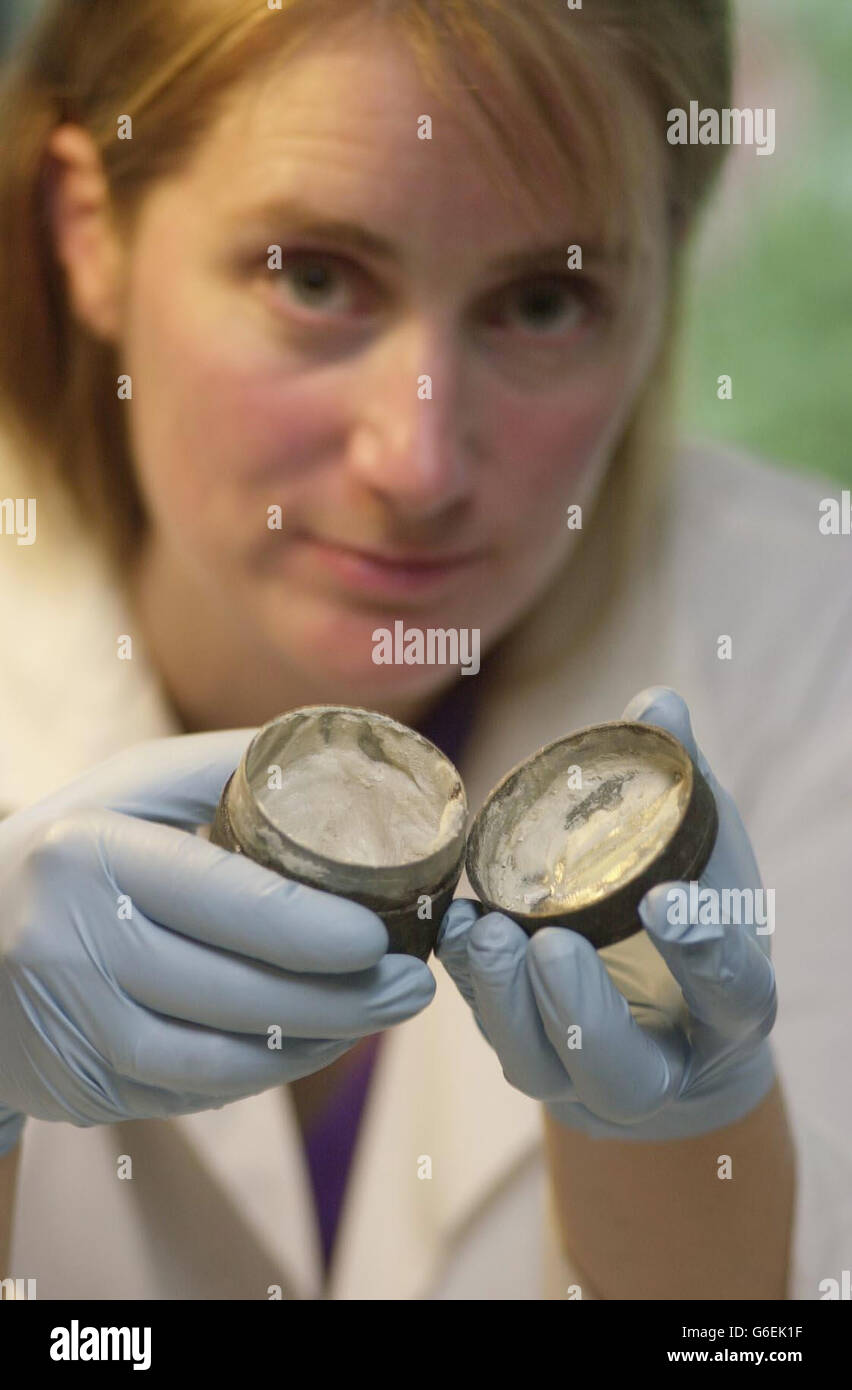 Conservator at the Museum of London, Liz Barham, displays an intact pot ...