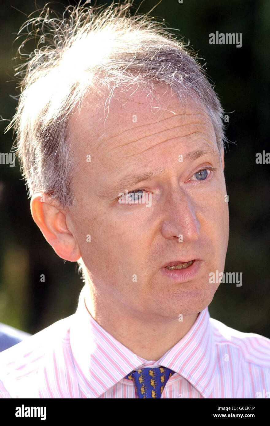 Local MP Henry Bellingham (centre) talks to press in the grounds of ...