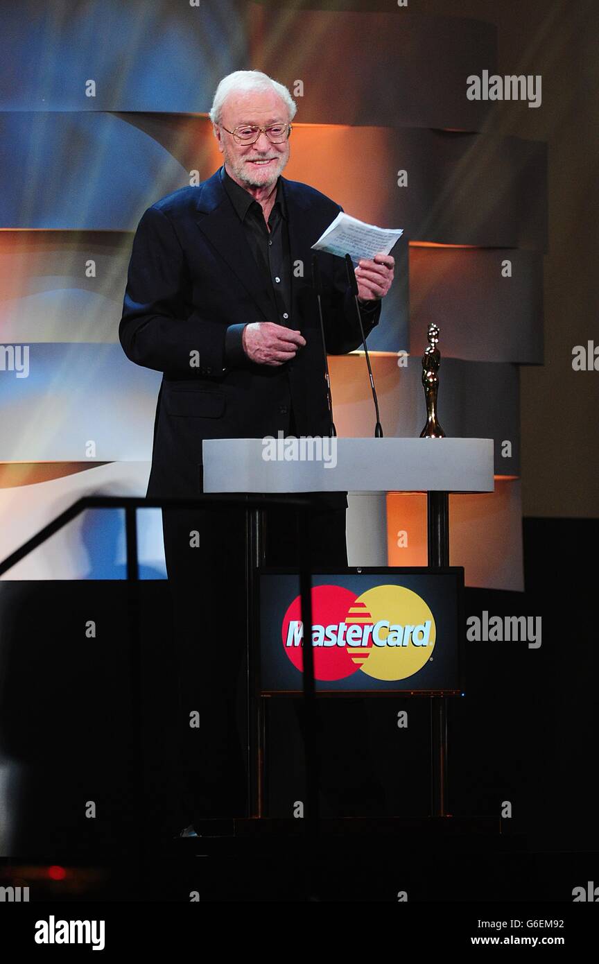 Sir Michael Caine presnts the award for Outstanding Contribution at the ...