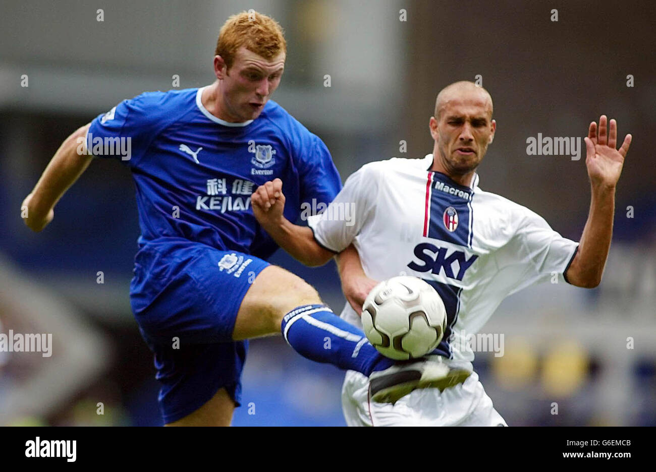 Everton's Nick Chadwick tries to kick past Bologna's Emanuele Troise ...