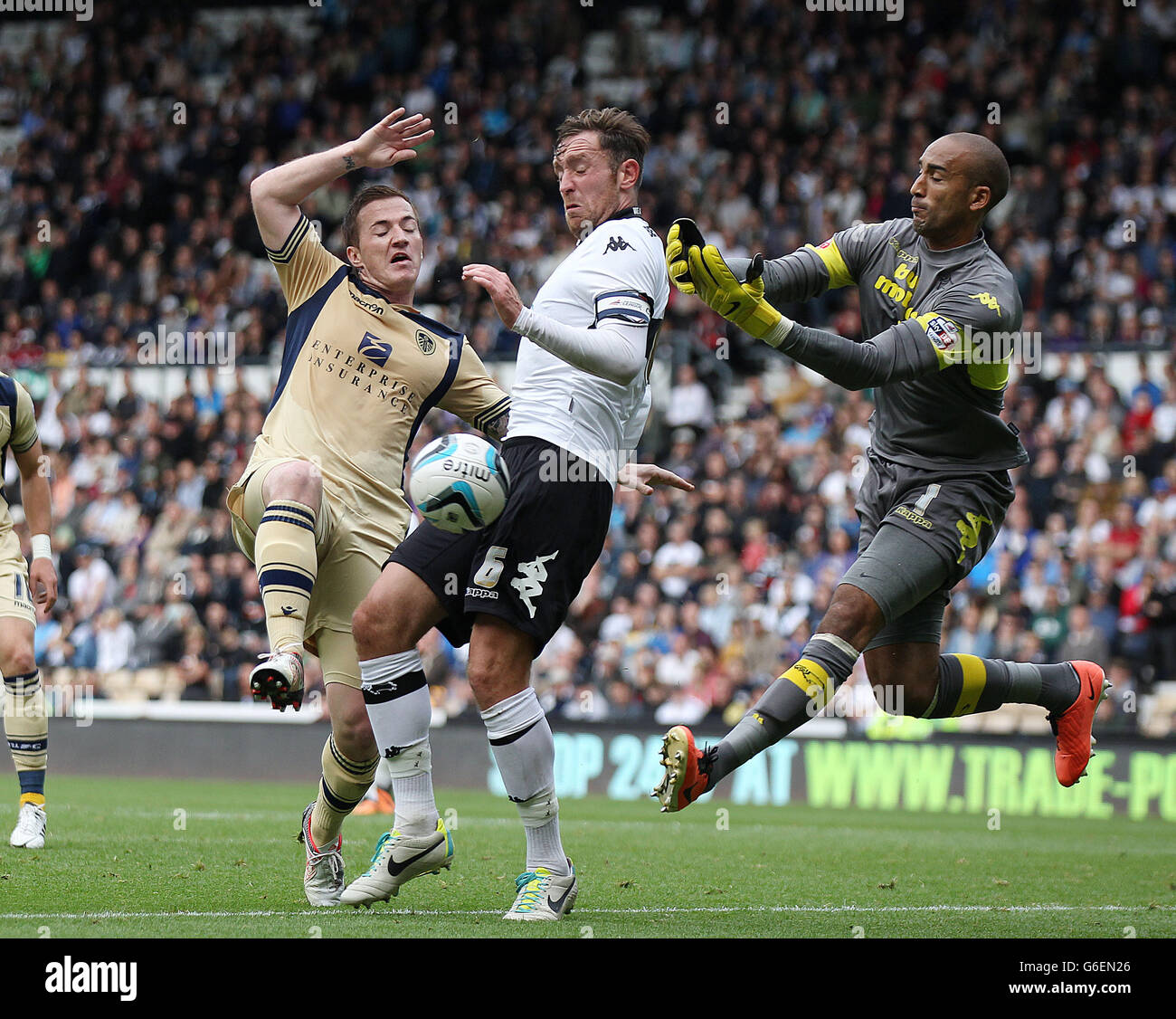 Derby County's Richard Keogh, goalkeeper Lee Grant and Leed United's ...