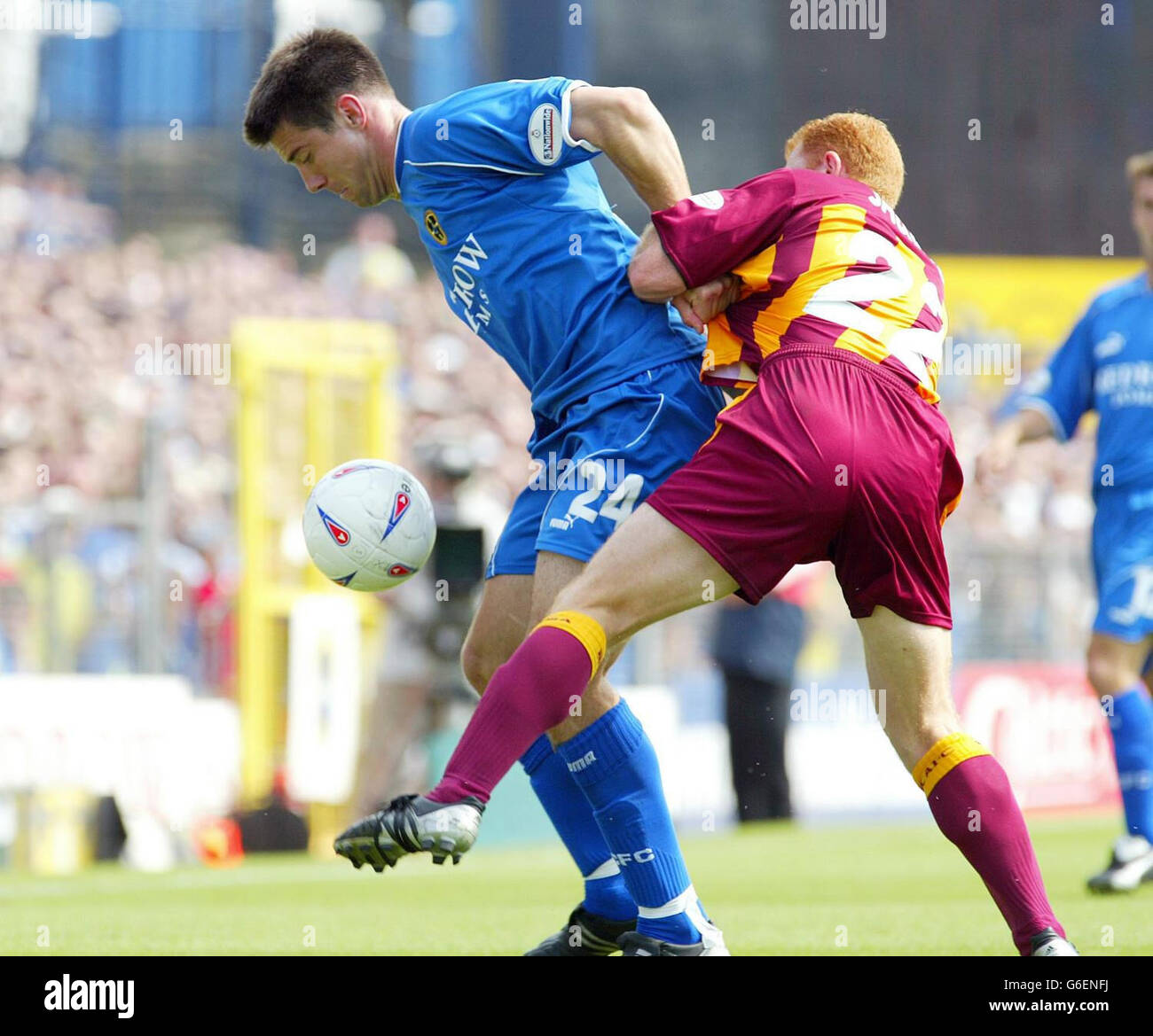 Cardiff City's Alan Lee is challenged by Bradford City's Wayne Jacobs ...