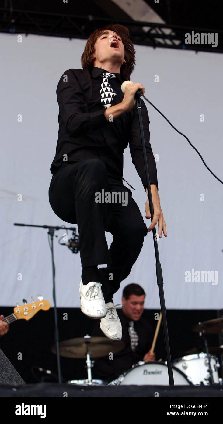 The Hives lead singer, Howlin' Pelle Almqvist performing on the V Stage ...